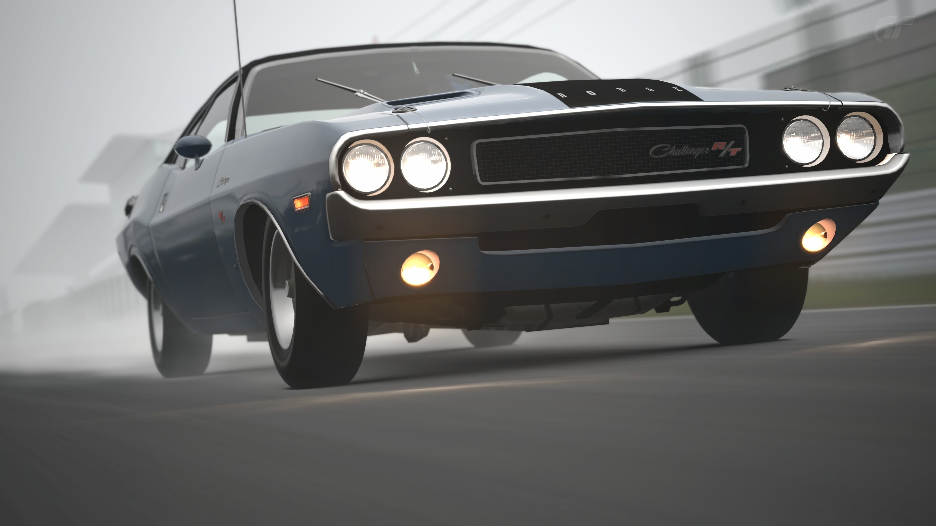 A Challenger approaches the rainy Suzuka straight. | GTPlanet